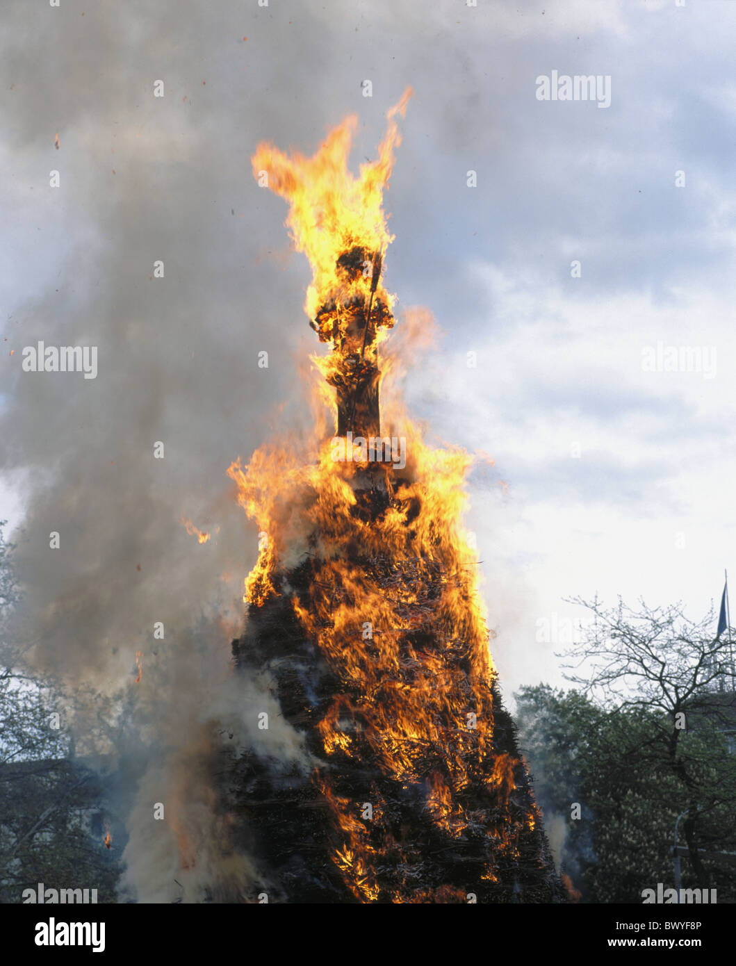 2003 Boogg tradition burning fire flames smoke Sechselauten town city ...