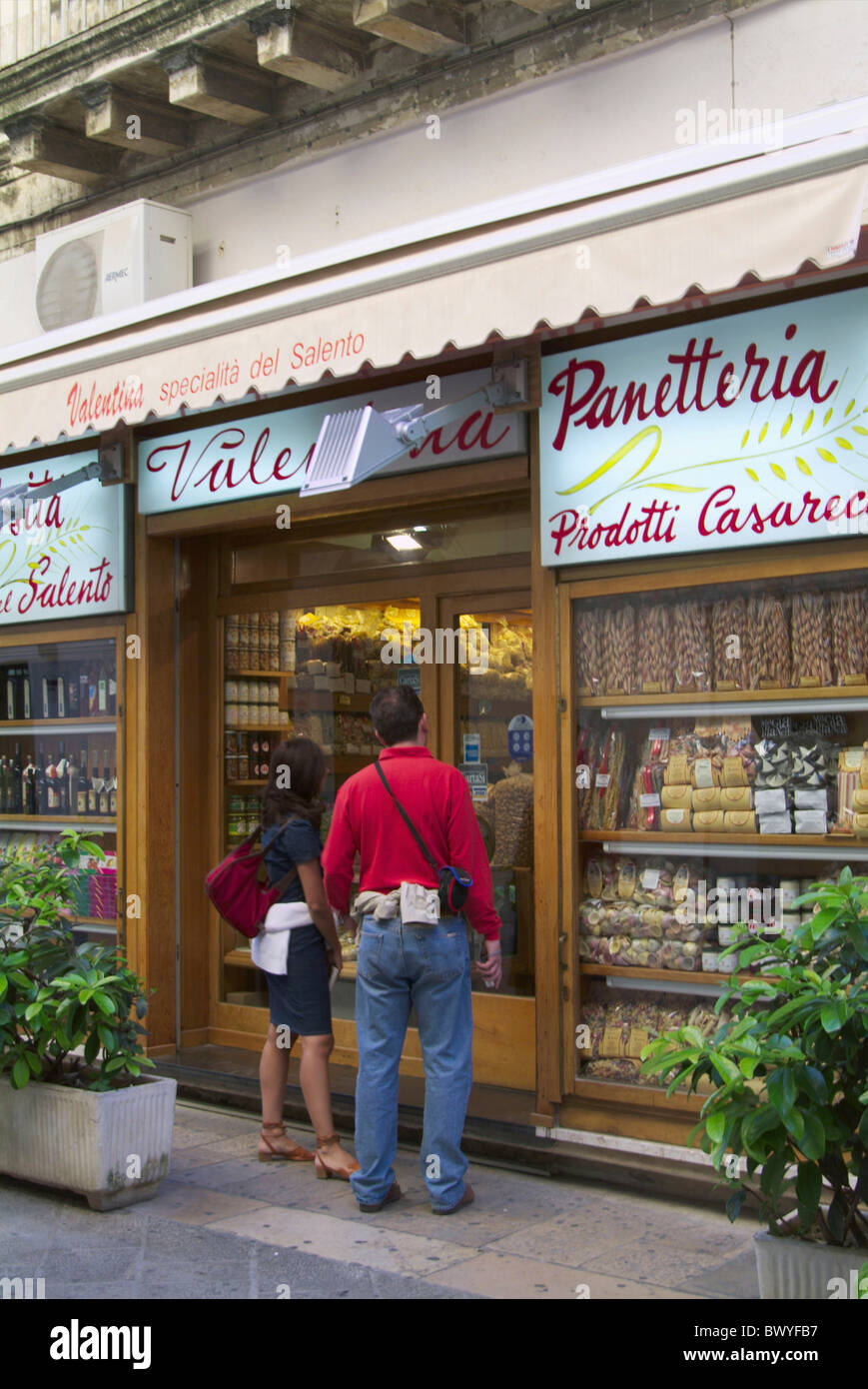 Apulia baker´s bakery breads and pastries business couple display ...