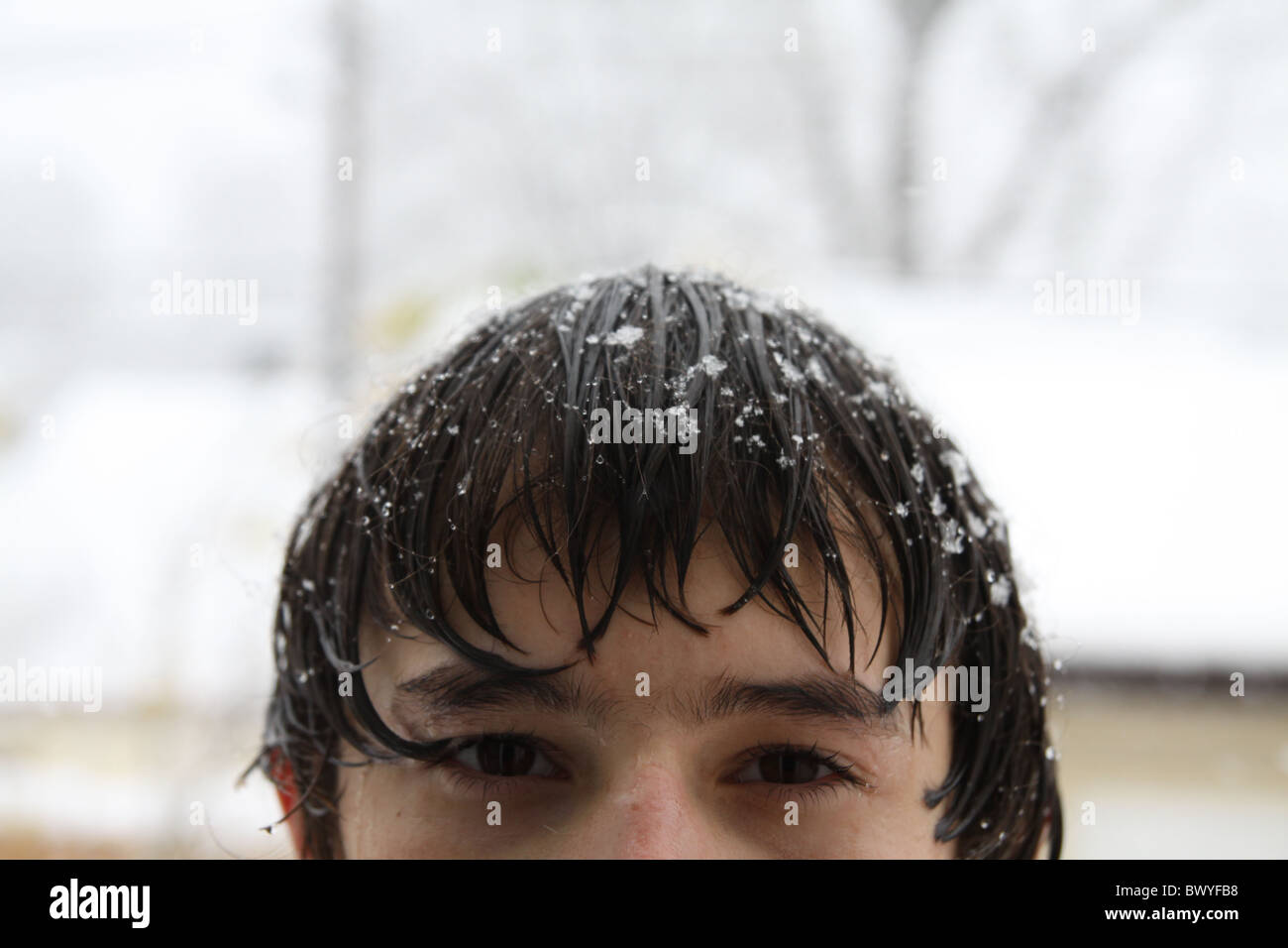 The top part of a boy's head, covered in snow Stock Photo - Alamy