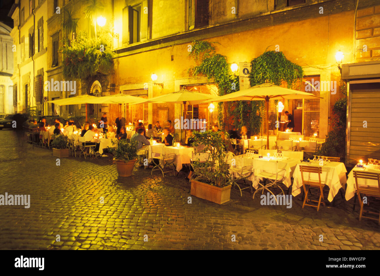 illuminated 10649720 outside cafe lane guests company Italy Europe ...