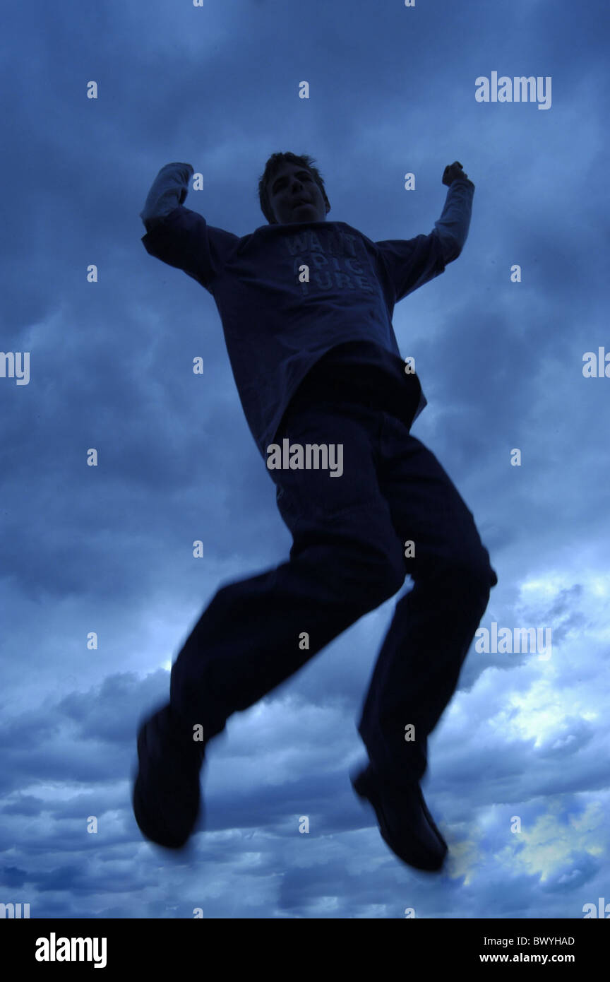 aerial jump boy dusk Dynamic jump jumping outside sky overview ...