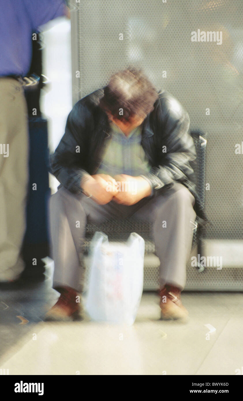 lonely man no model release plastic plastic bag problematic sit sadly ...