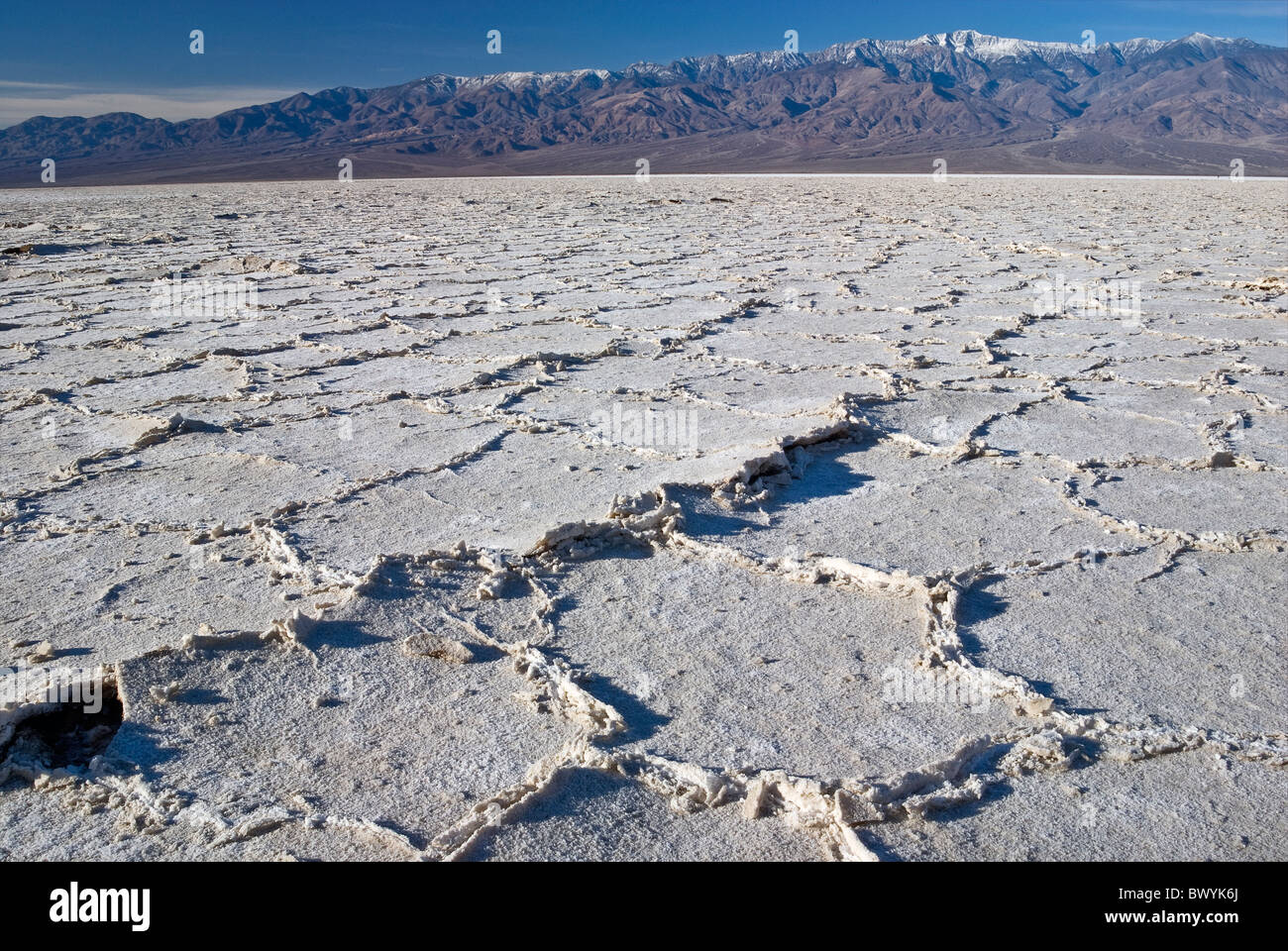 Salt pans, cracks, evaporation patterns at Salt Flats, Panamint Range ...