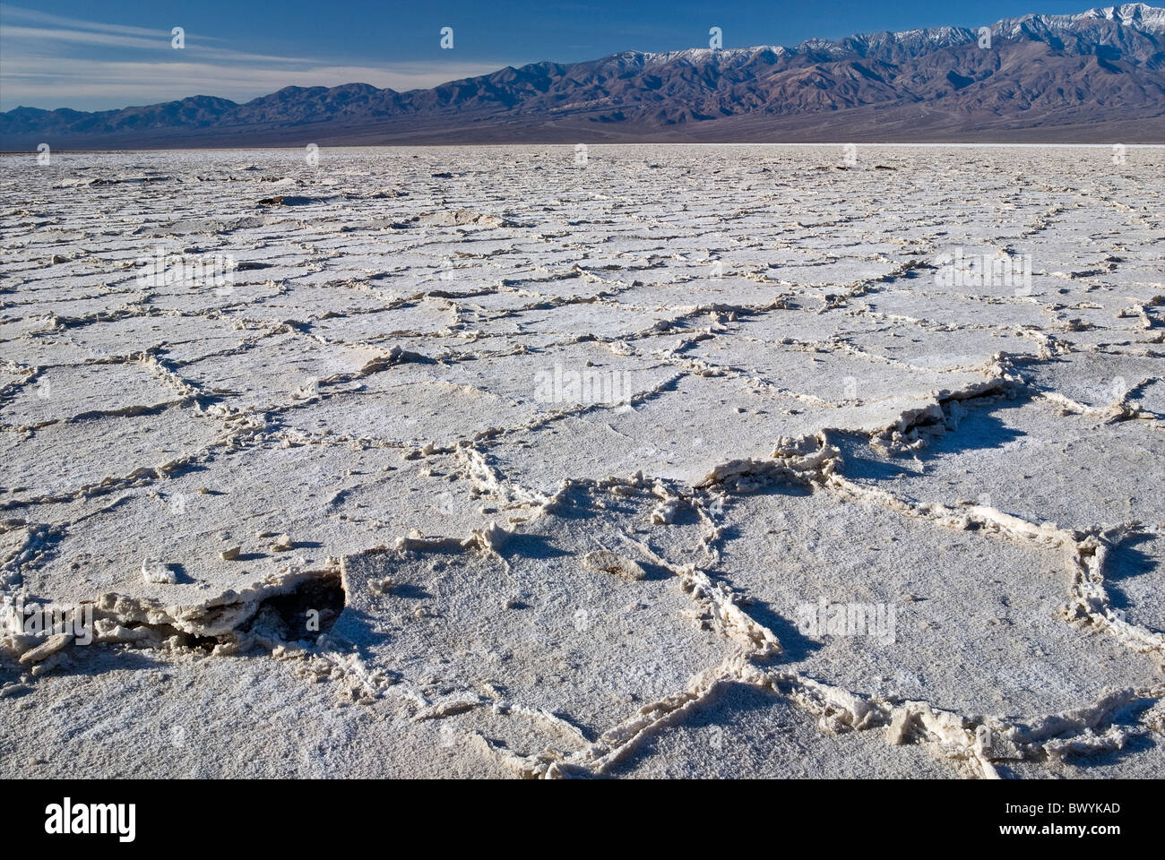 Salt pans, cracks, evaporation patterns at Salt Flats, Panamint Range ...