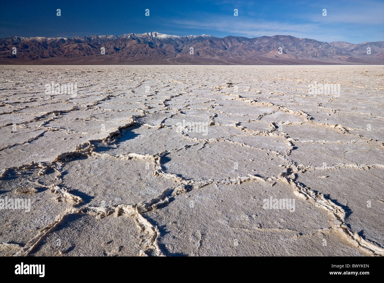 Salt pans, cracks, evaporation patterns at Salt Flats, Panamint Range ...
