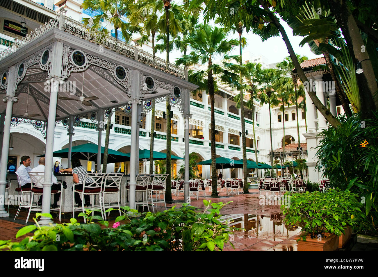 Interior courtyard and bar at Raffles hotel in Singapore Stock Photo ...