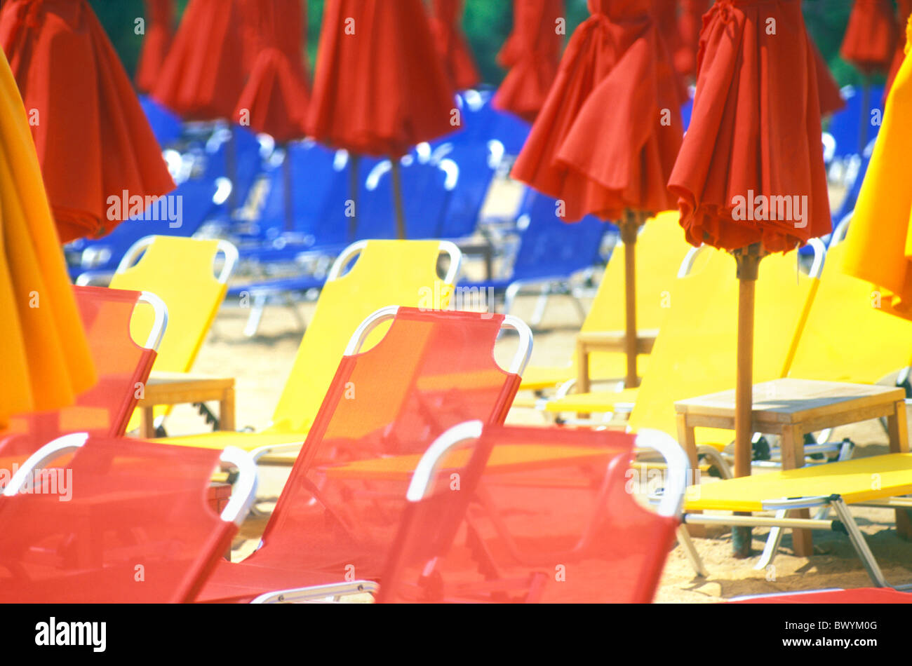 Athens beach detail blue ferien yellow Greece empty deck chairs red ...