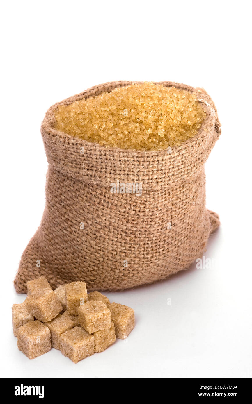 Cane sugar in small burlap sack Stock Photo - Alamy