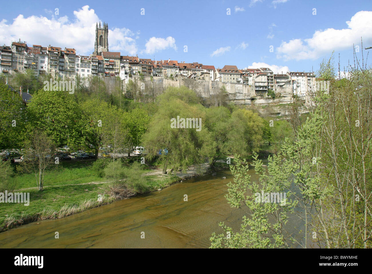 Old Town view facades river flow spring canton Freiburg cathedral Saane ...