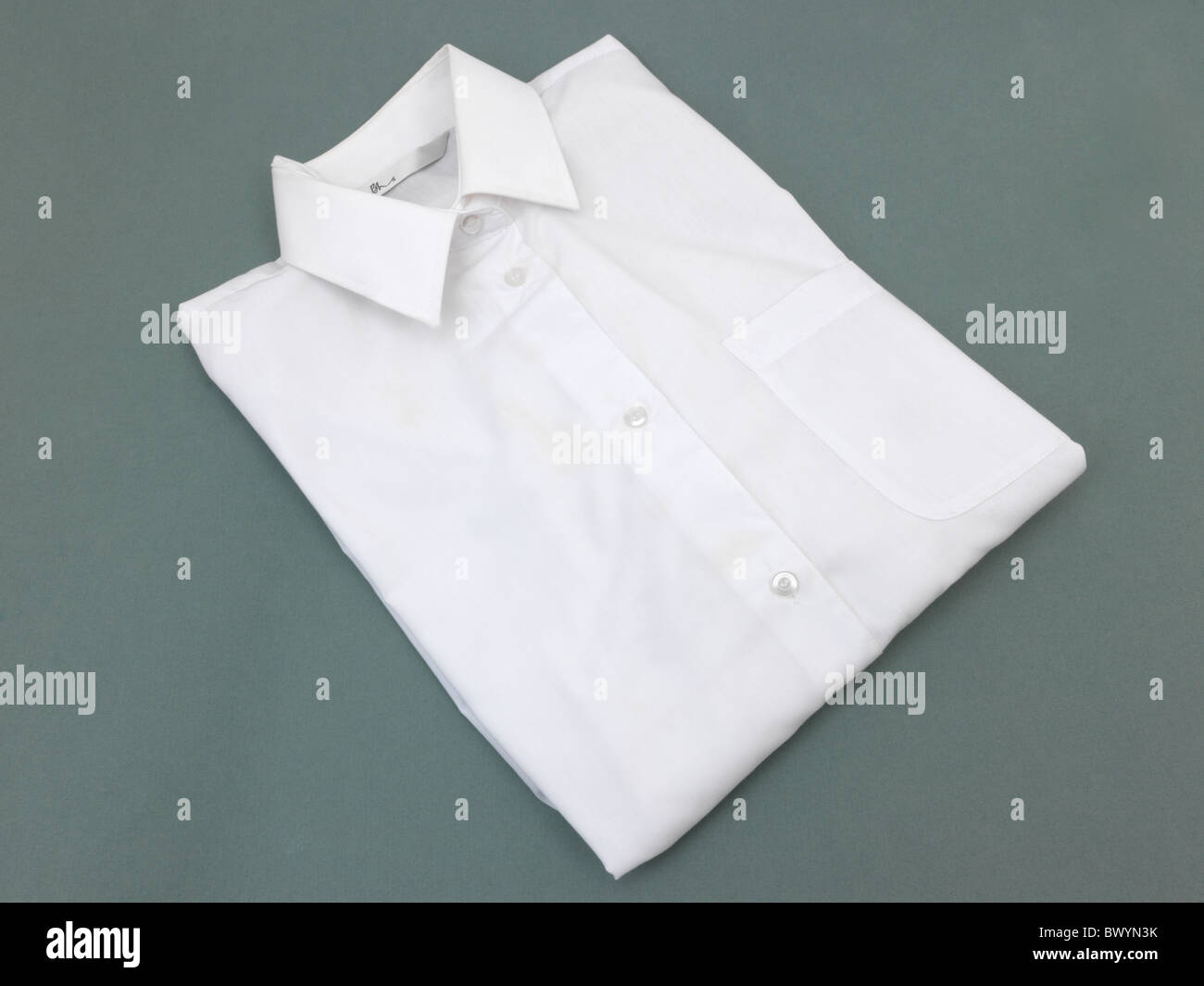 Neatly Folded White Shirt Stock Photo - Alamy