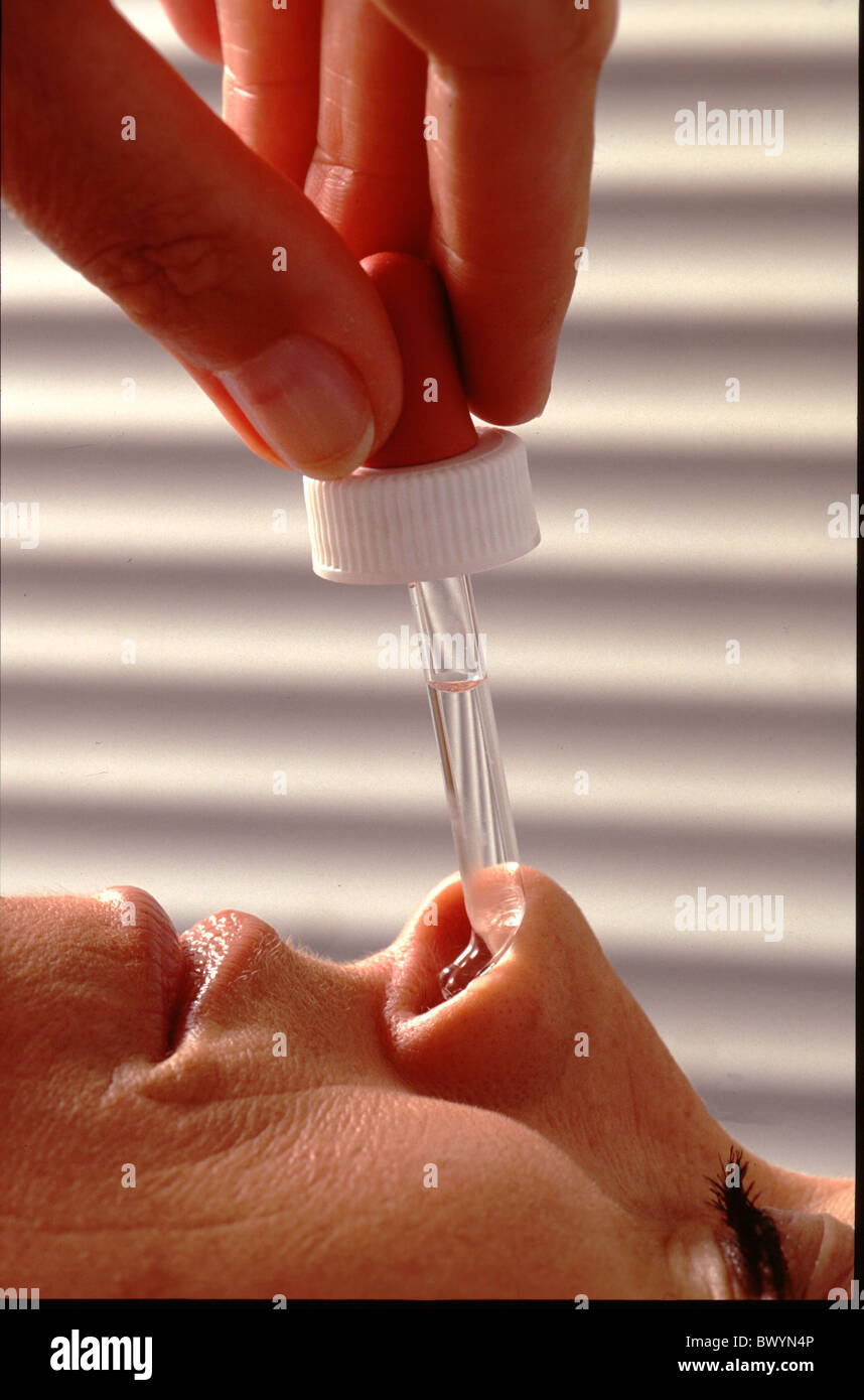 drop health medicine medicines nose nose drop Woman Stock Photo - Alamy