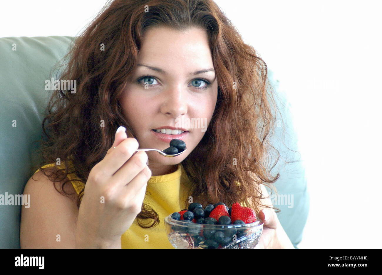 berries blue eyes bowl eating food fruit healthy portrait red hair ...