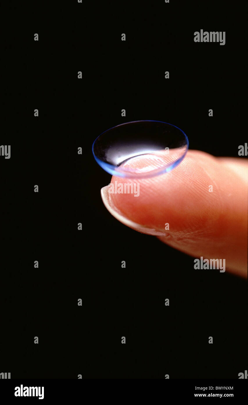 Contact lens Contacts finger optics point of view seeing Stock Photo ...
