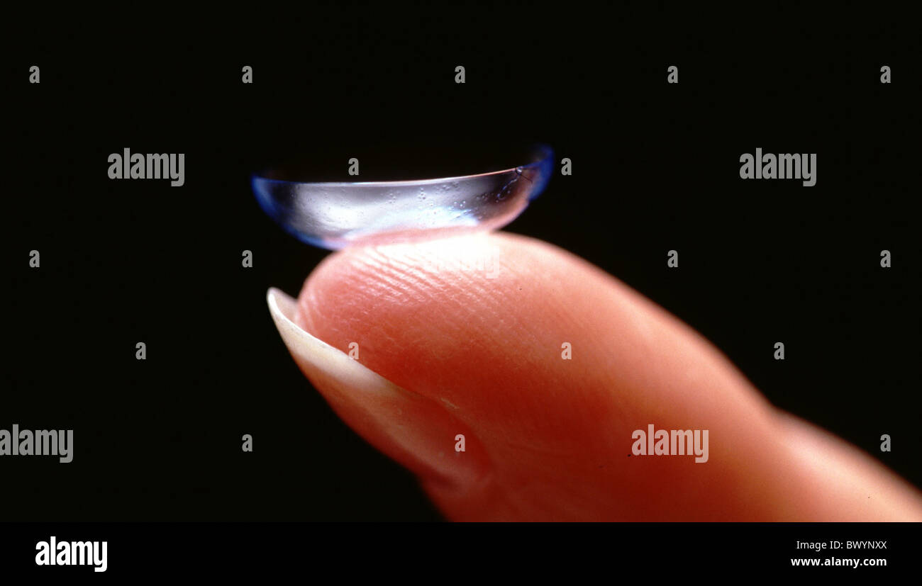 Contact lens Contacts finger optics point of view seeing Stock Photo - Alamy
