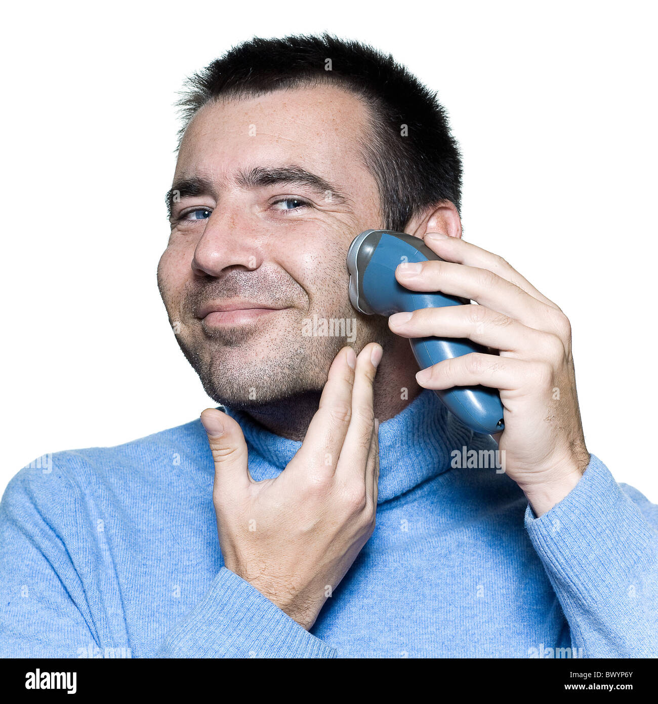studio portrait on isolated background of a stubble man shaving ...
