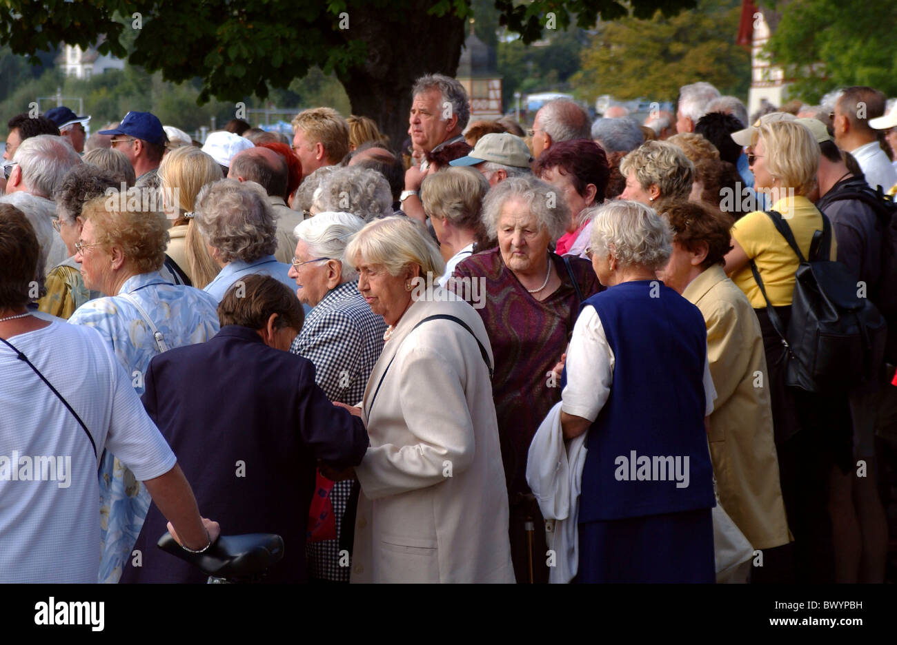 folks group human queue mass no model release people person seniors ...