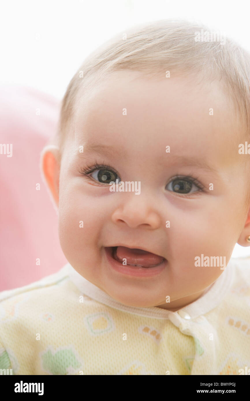 Smiling Hispanic baby girl Stock Photo - Alamy