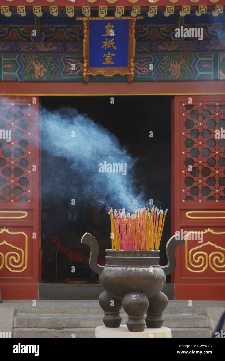 Burning incense in Ditan Temple, Beijing, China Stock Photo - Alamy