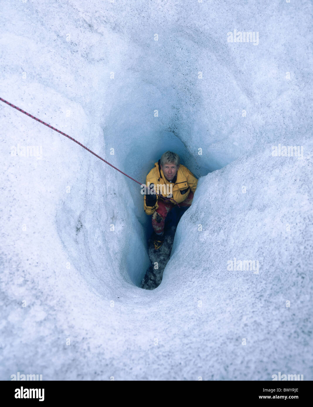 mountain rescue mountaineering sport ice glacier in fissure gaps hole ...