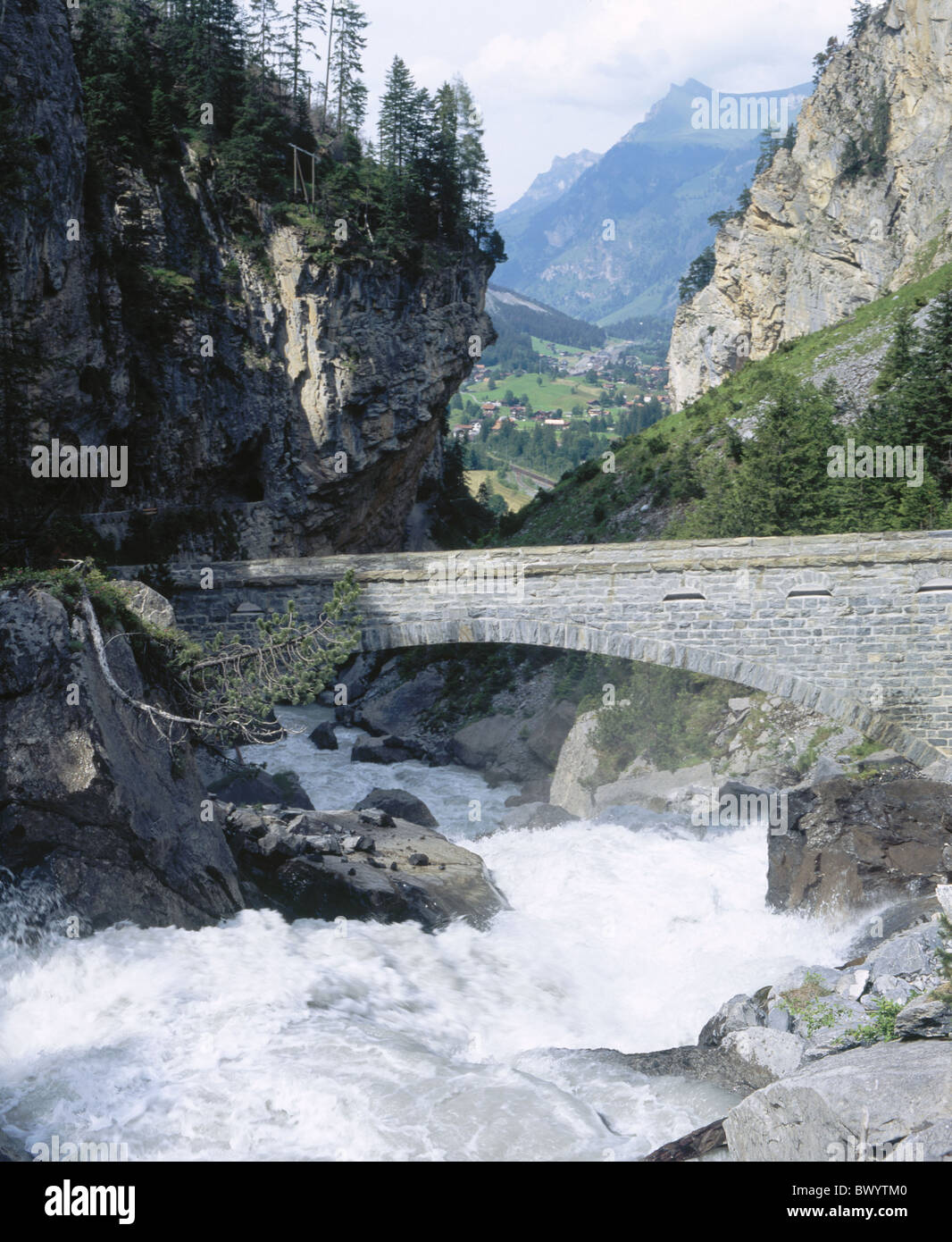 alpine Alps mountains Bernese Oberland bridge river flow Gasterntal ...