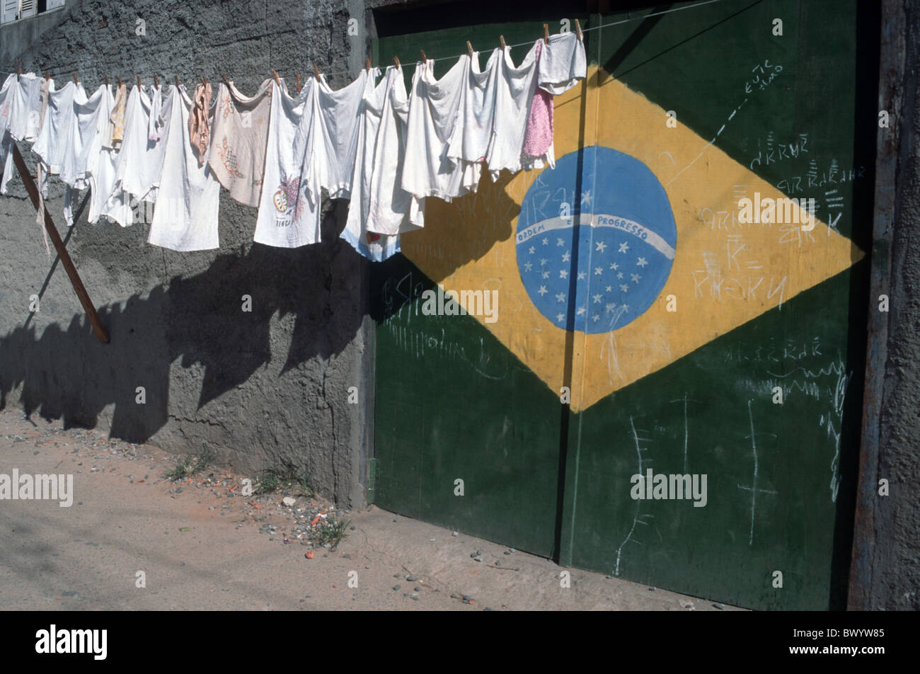BRAZIL. BRAZILIAN FLAG AND DRYING CLOTHES IN A FAVELA SHANTY TOWN OF ...