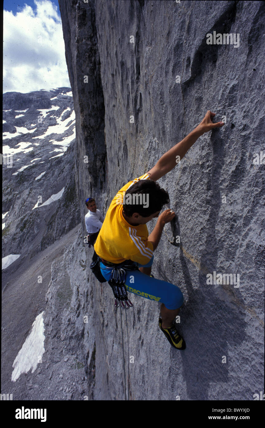 cliff wall climbing Free climbing rock sports two men Stock Photo - Alamy
