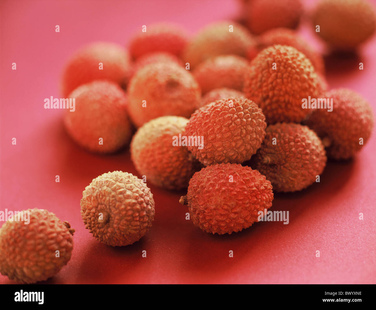 near bowl feeding food fruit healthy Lychee Lychees many pink roughly ...