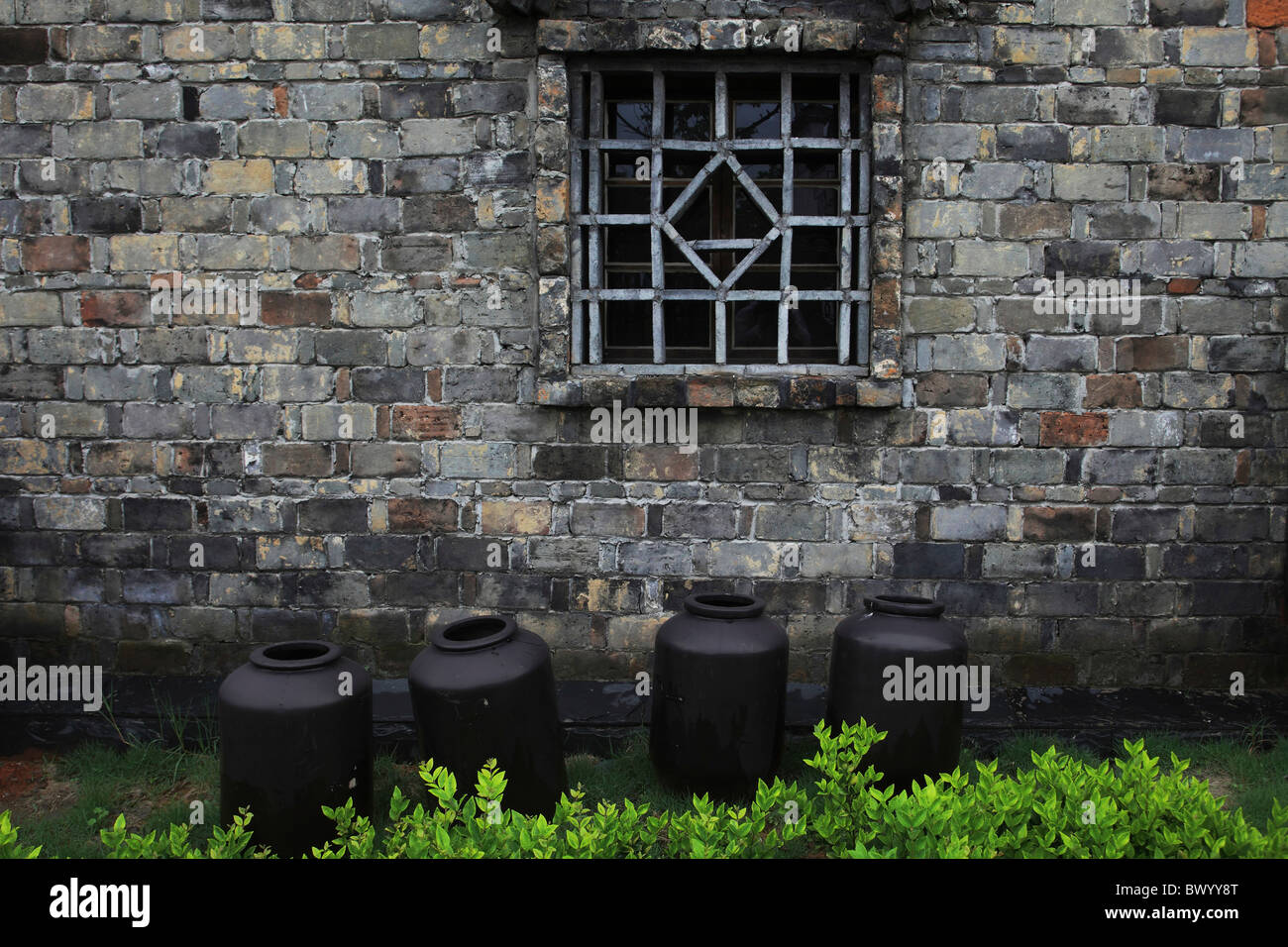 Gray brick wall of a traditional Hui style home, Xinghua Village ...