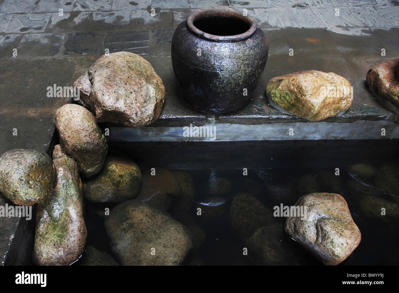 Empty wine vat placed next to a indoor stone pool, Xinghua Village ...