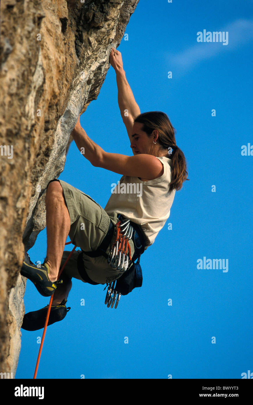 cliff wall climbing Free climbing man rock Sports Stock Photo - Alamy