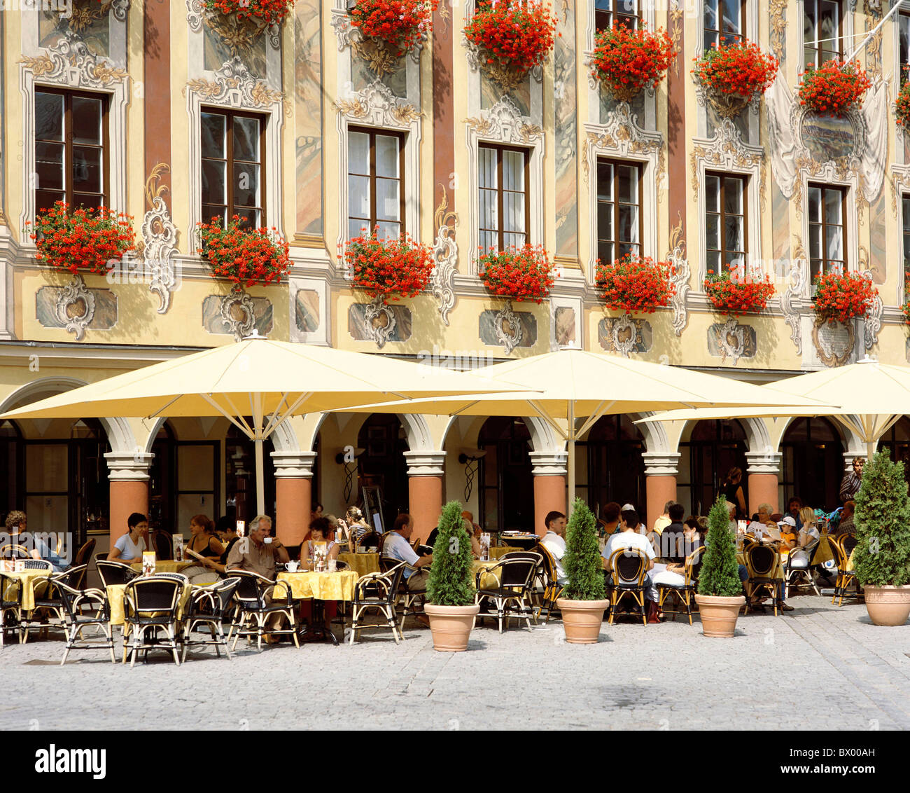 outside Bavaria paints flowers cafe Germany Europe facade guests ...