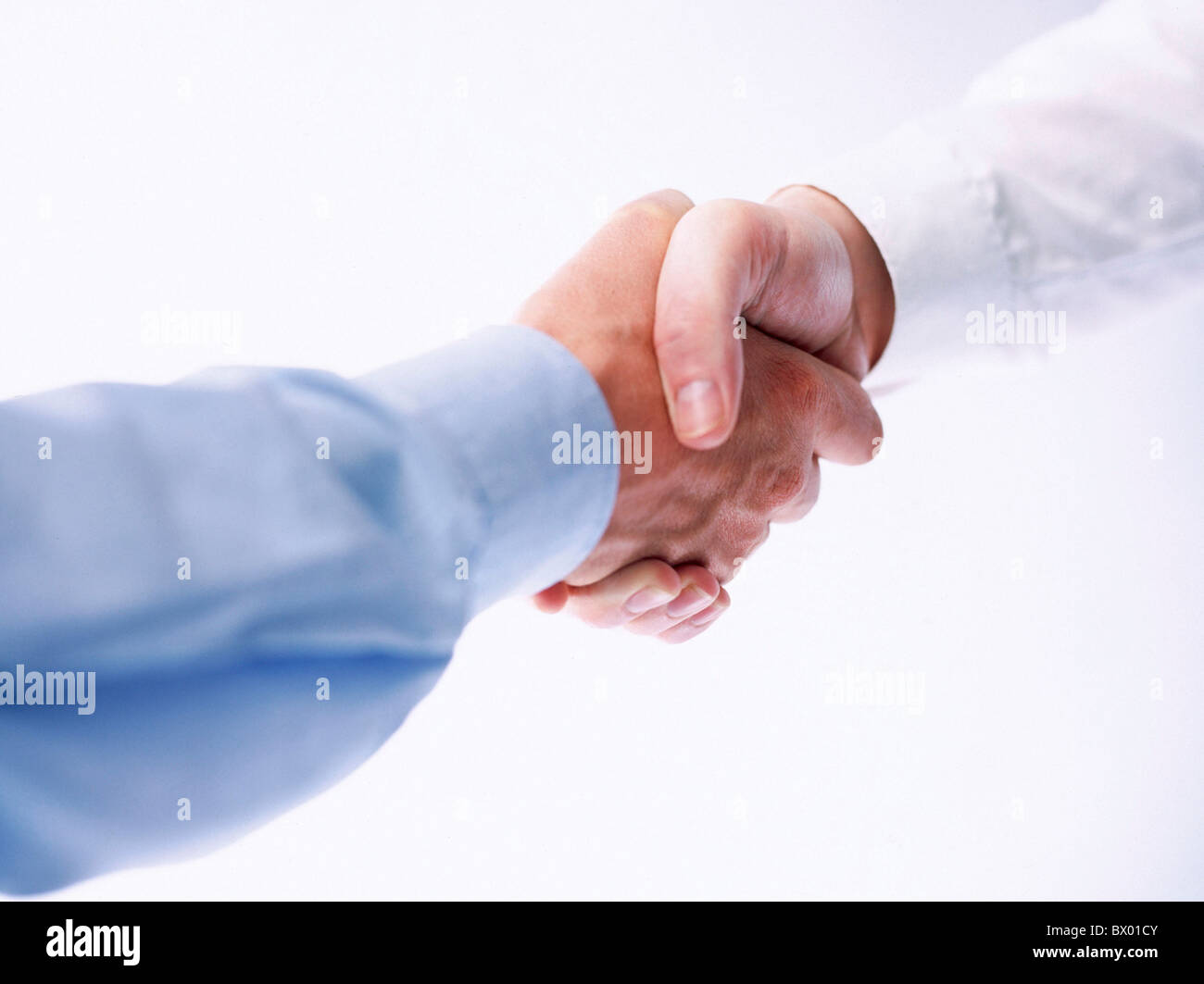 business handshake hand shake studio symbol Stock Photo - Alamy