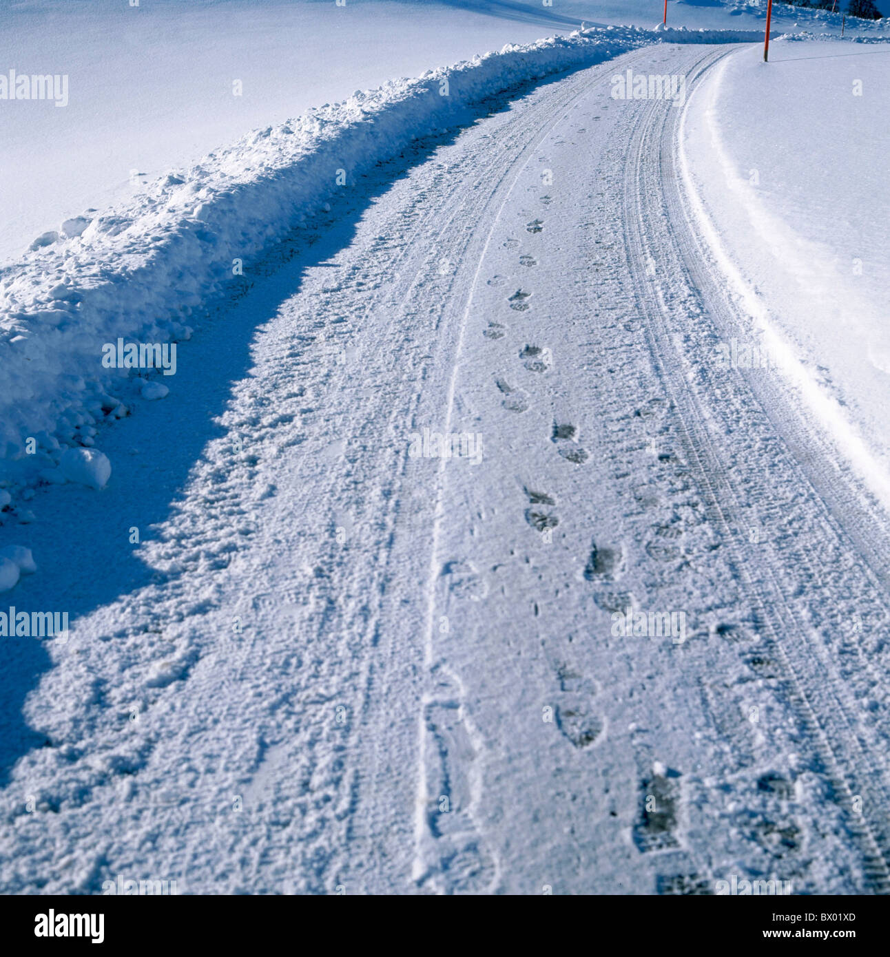 footprints country road street empty posts jambs tire tracks traces ...
