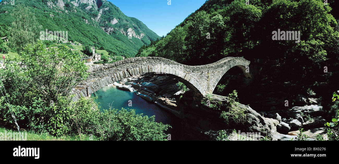 alpine Alps bathing mountains bridge river flow canton Ticino ...