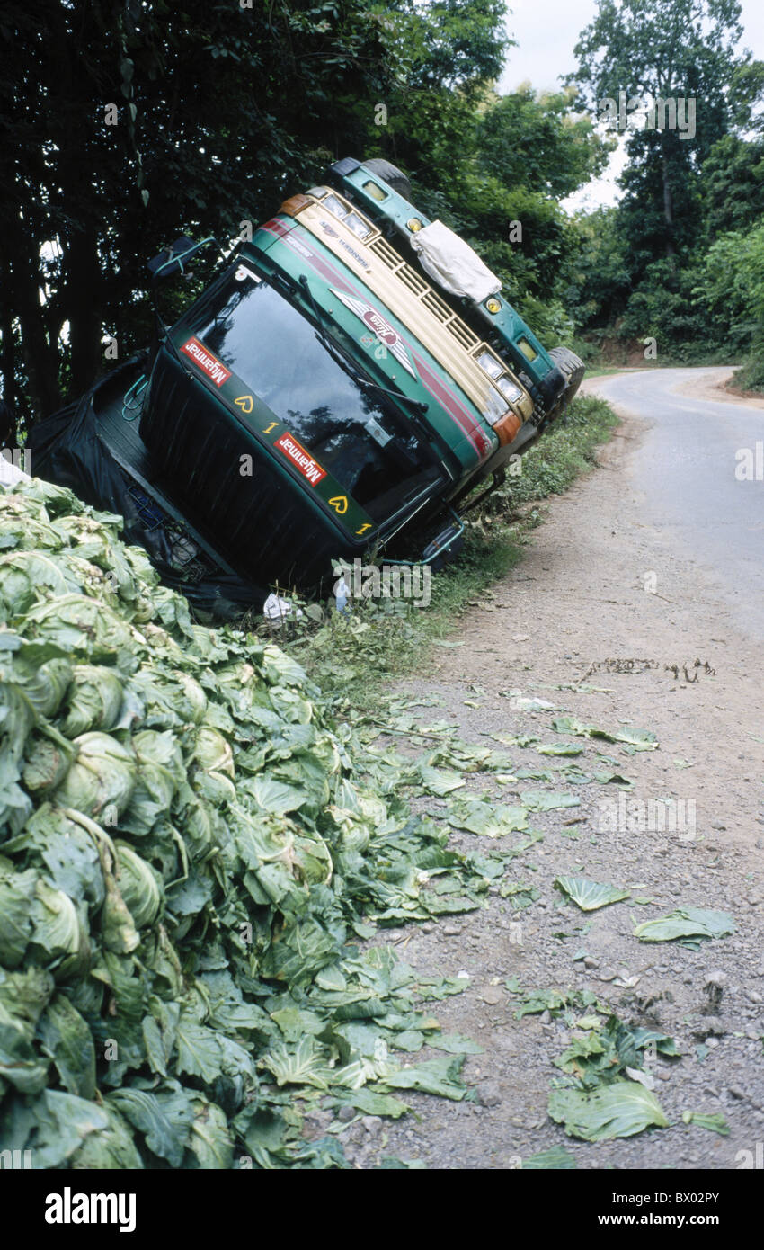 Burma Asia cabbage load truck street edge traffic fallen accident ...