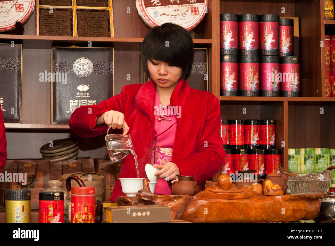 Chinese woman performing a tea ceremony, Kunming, Yunnan Province ...