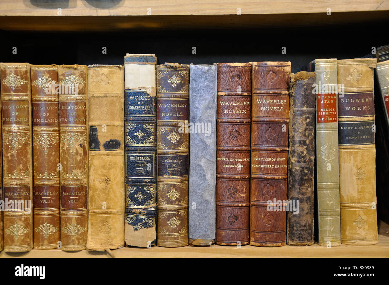 Old books in antique bookstore Stock Photo - Alamy