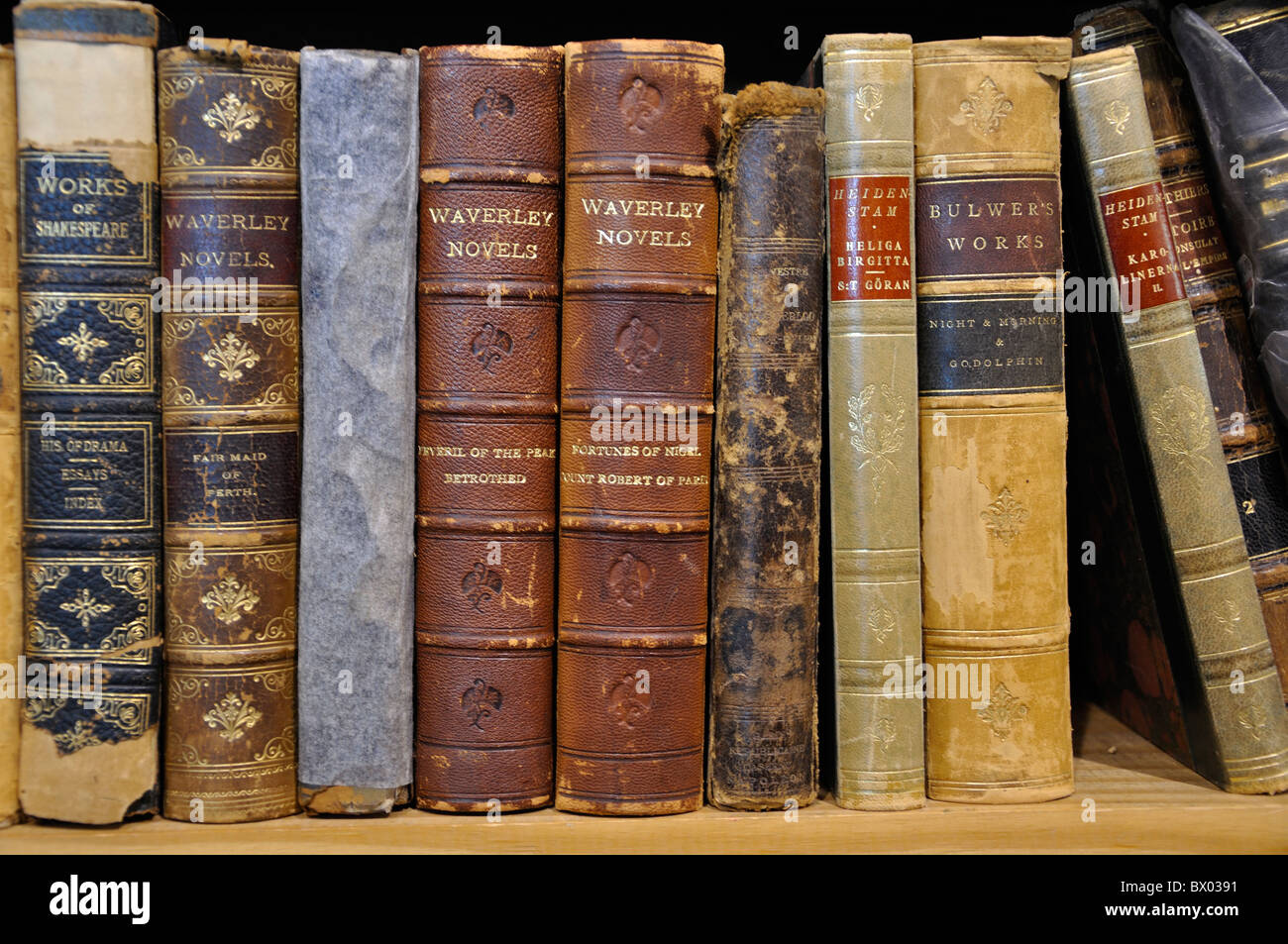 Old books in antique bookstore Stock Photo - Alamy