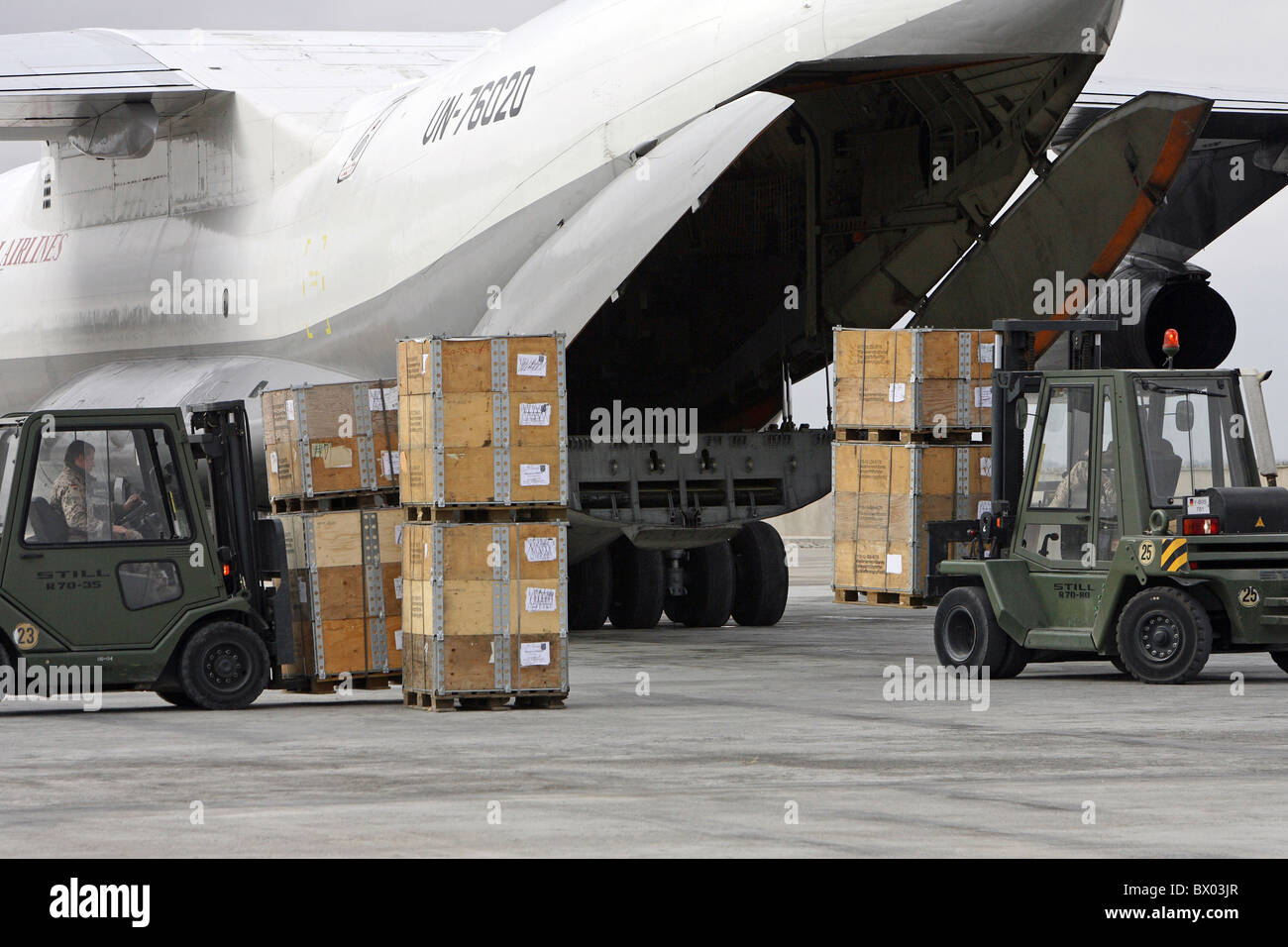 Unloading of a cargo plane at the airport in Camp Marmal, Mazar-e ...