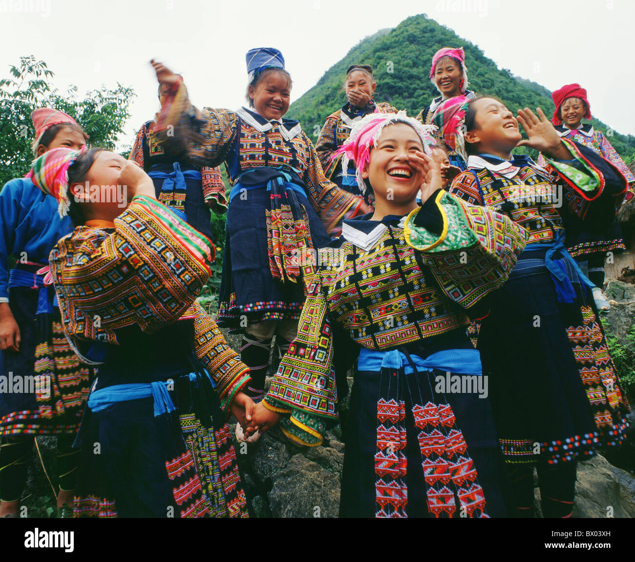 Su Miao women in traditional costume singing, Dawantun, Machang Village ...