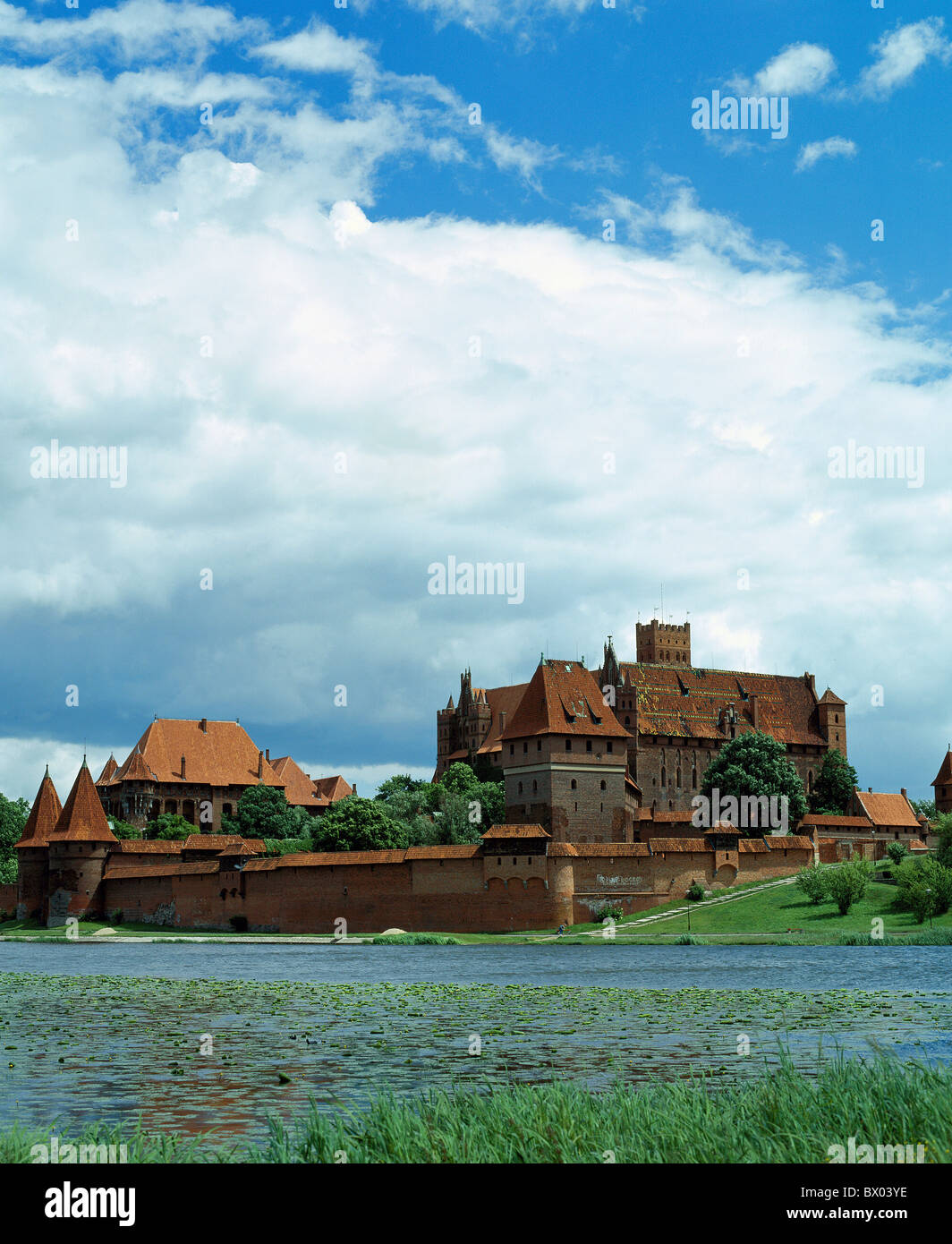 near Gdansk wall Poland red brick castle Maria castle Pond Stock Photo ...