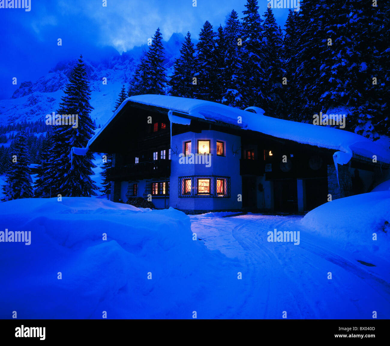 chalet summer cottage house home mountains at night night snow snow ...
