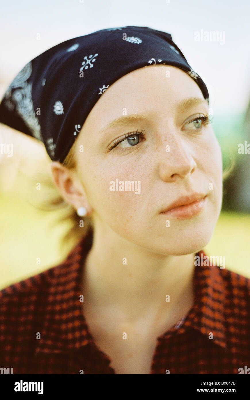 A woman looks to the right Stock Photo - Alamy