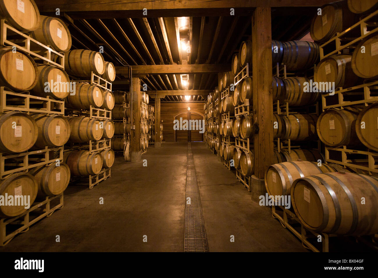 Wine barrels stacked inside a Sonoma County, California winery Stock ...