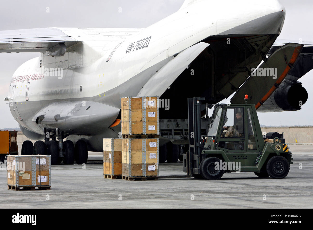 Unloading of a cargo plane at the airport in Camp Marmal, Mazar-e ...