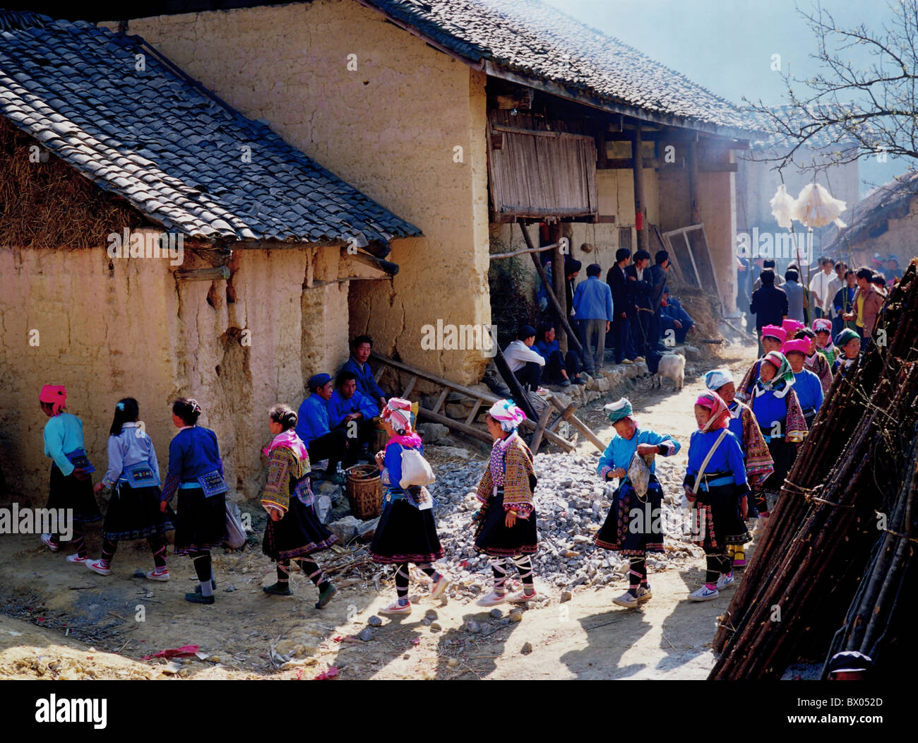 Su Miao mourners circling the house of the deceased during a funeral ...