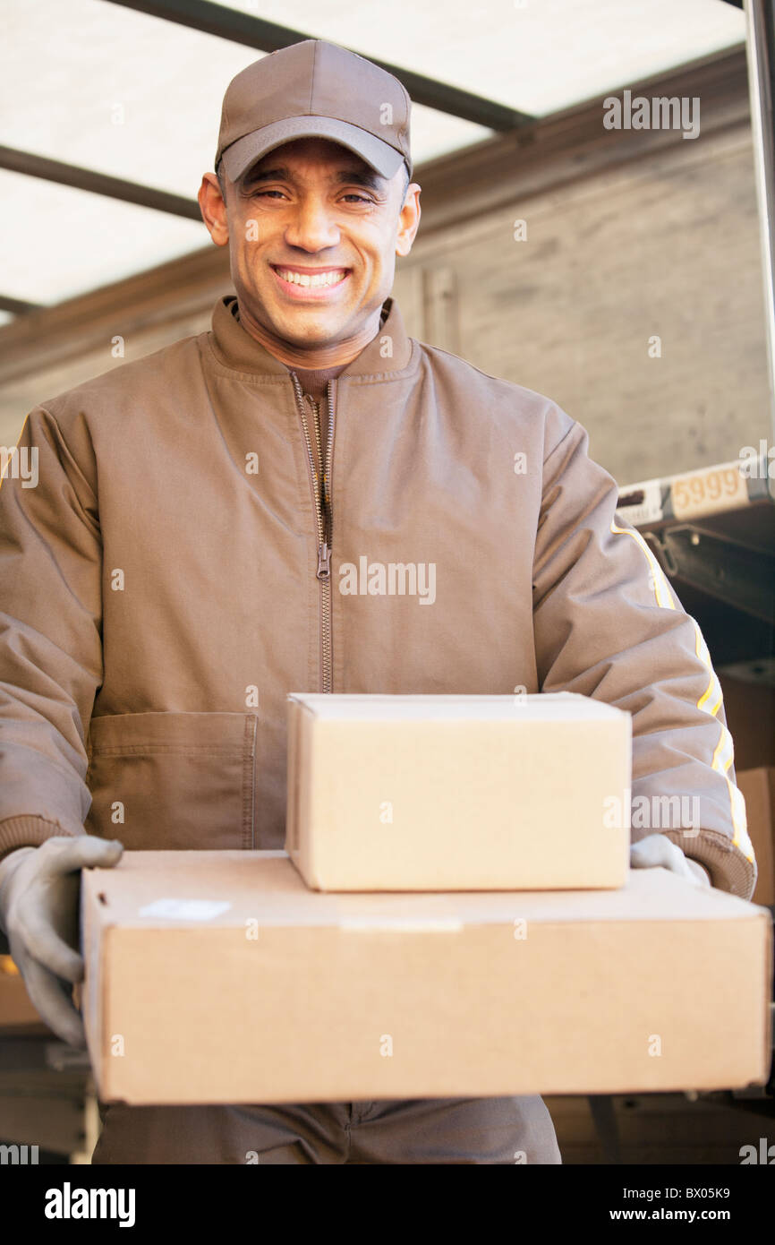 Delivery man boxes truck hi-res stock photography and images - Alamy
