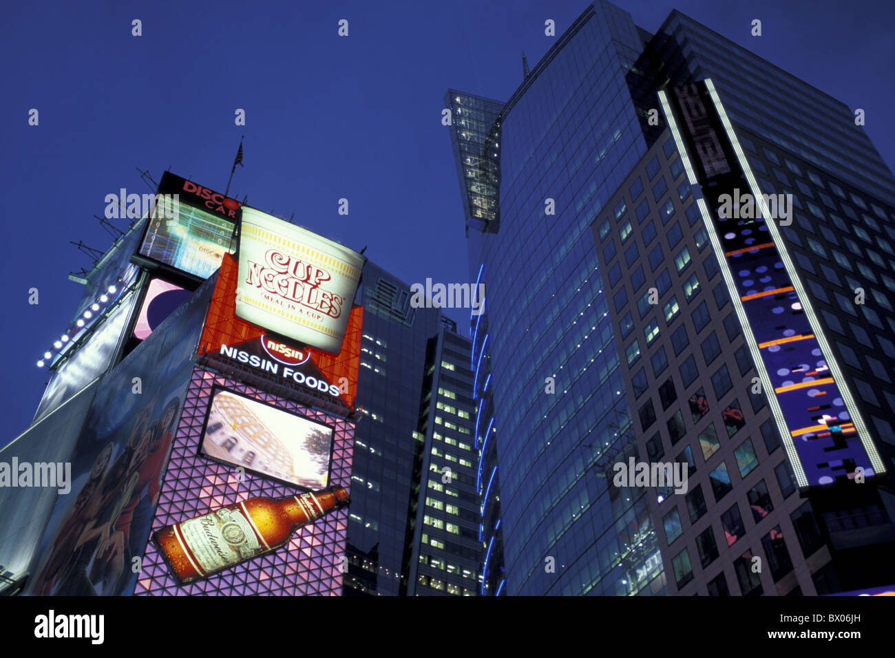 at night blocks of flats High-rise buildings Manhattan neon lights New ...