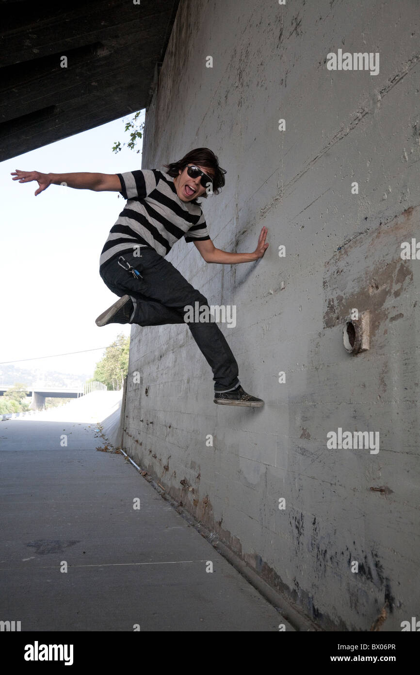 Jumping off wall hi-res stock photography and images - Alamy