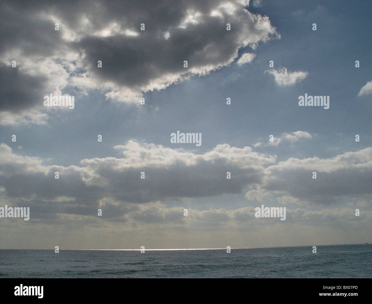 sea nature mood rays beams waters clouds weather Stock Photo - Alamy